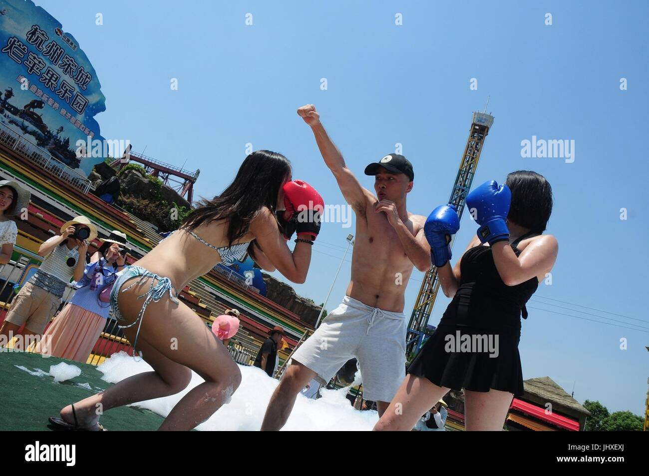 Hangzh, Hangzh, China. 16th July, 2017. Women wearing bikinis attend a bubble boxing match at ...