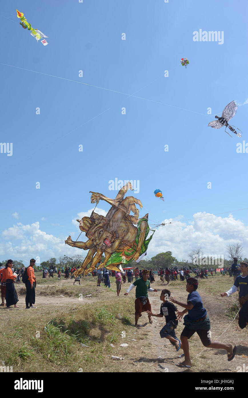 Bali, Indonesia. 16th July, 2017. Balinese fly their traditional kites ...