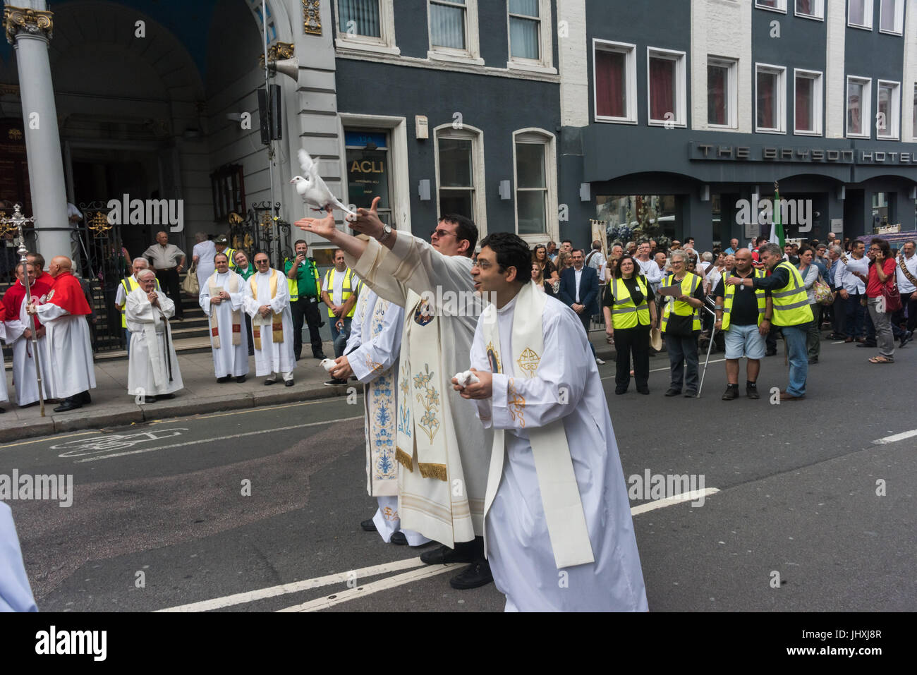 London, UK. 16th July 2017. Clergy release three doves at the start of ...