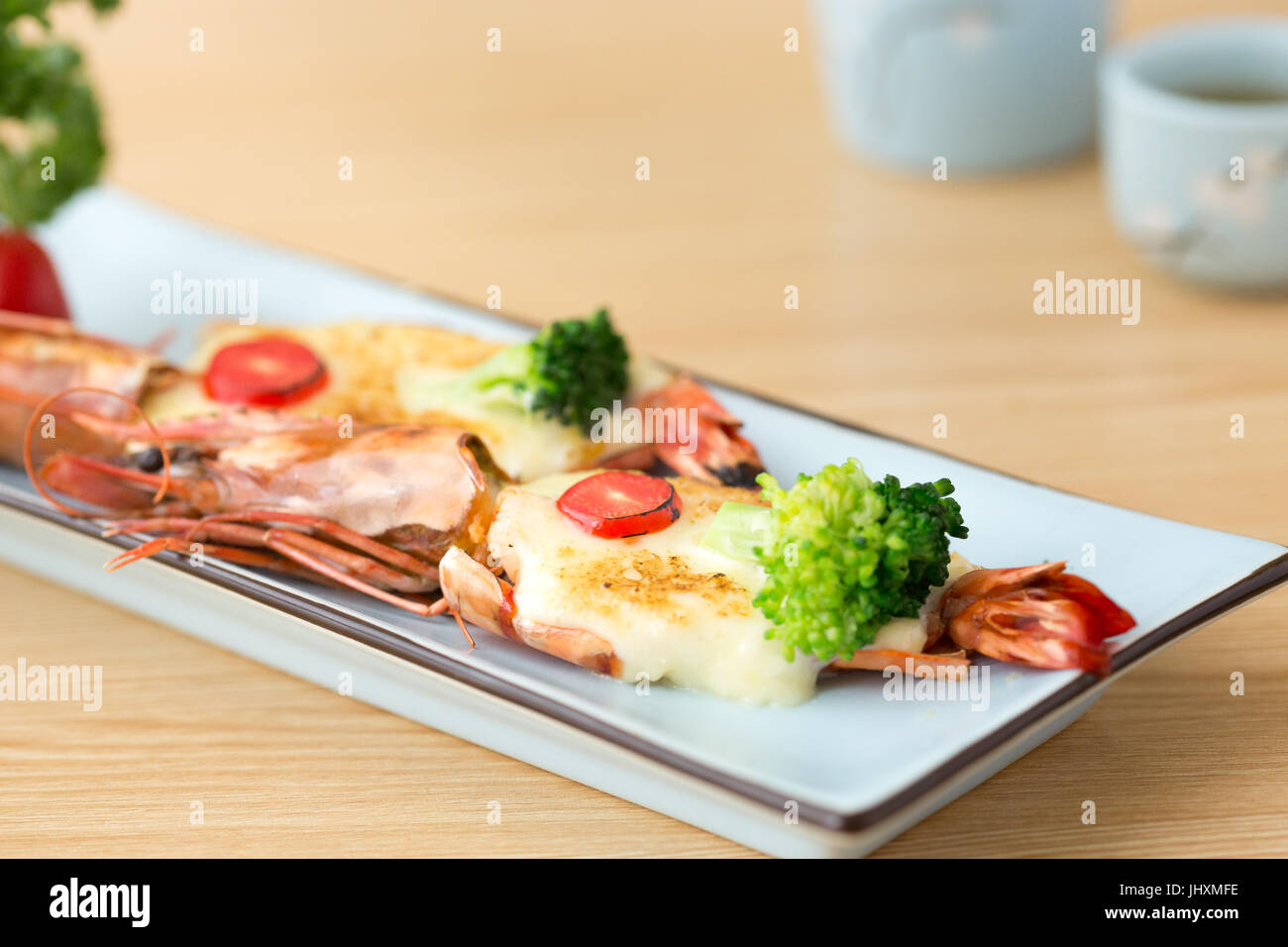 A Plate of Grilled Prawns on the Table Stock Photo - Alamy