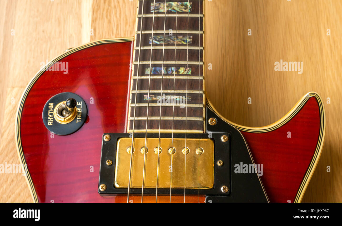 Close up of musical stringed instrument, electric guitar, featuring ...