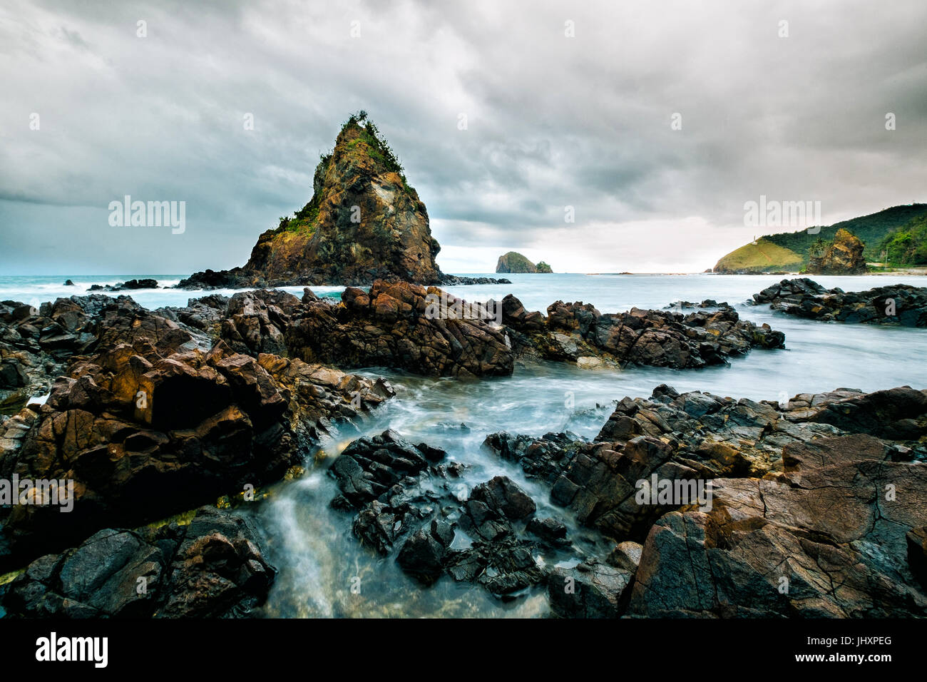 Rock formation in Diguisit beach Stock Photo - Alamy
