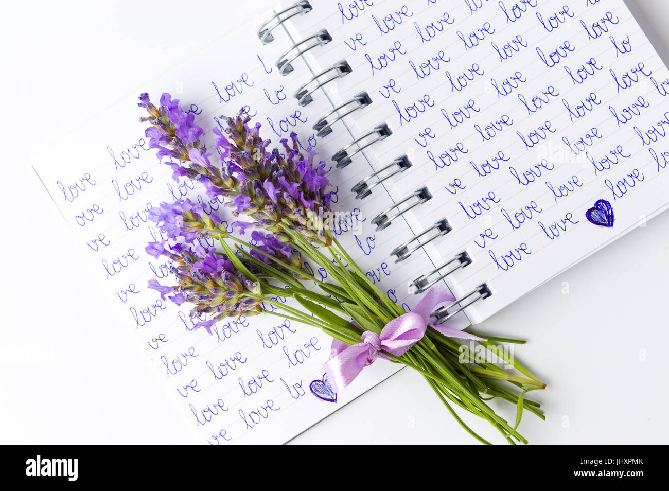 Lavender flowers bouquet on an open notebook Stock Photo - Alamy