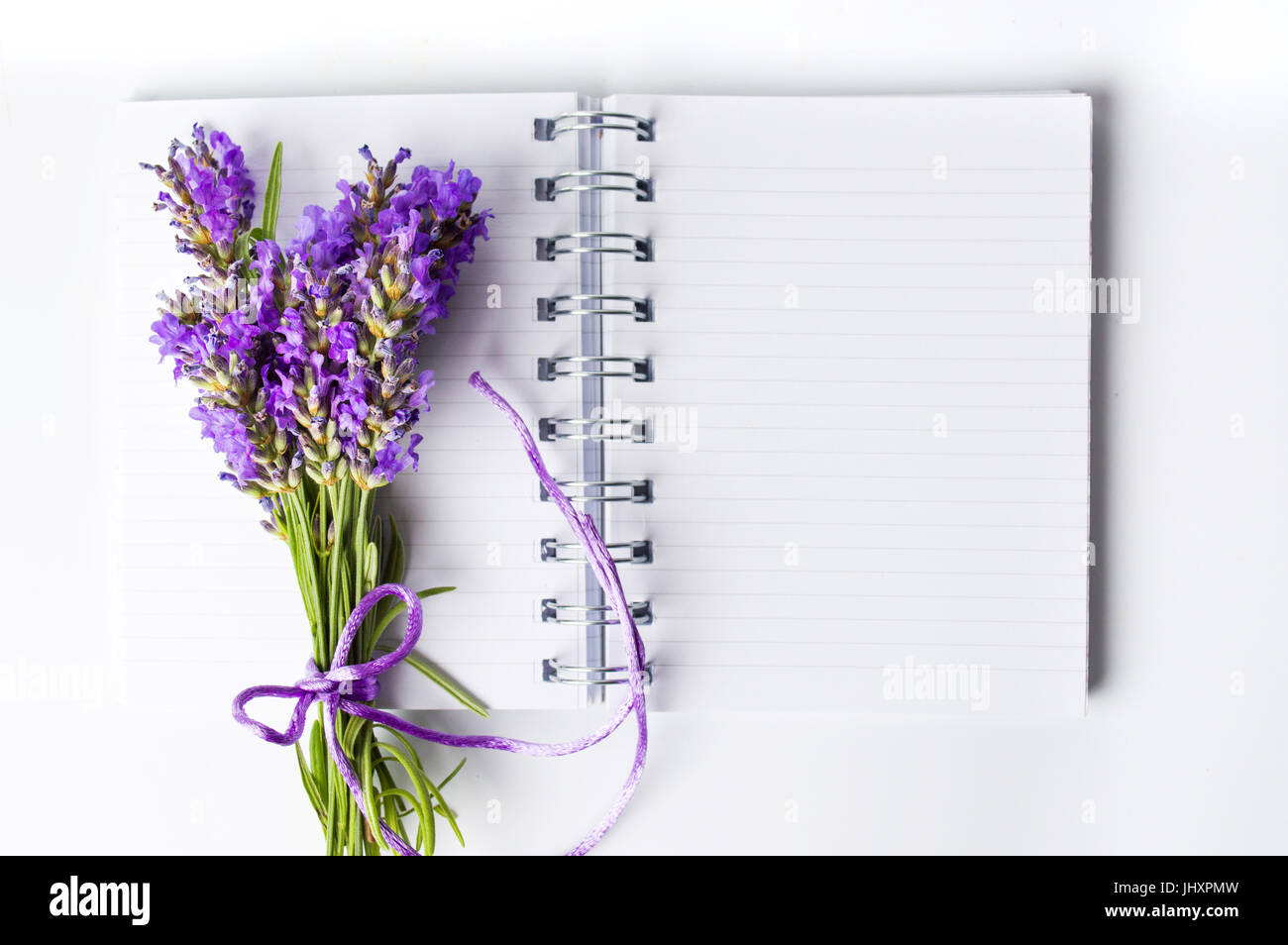 Lavender flowers bouquet on an open notebook Stock Photo - Alamy
