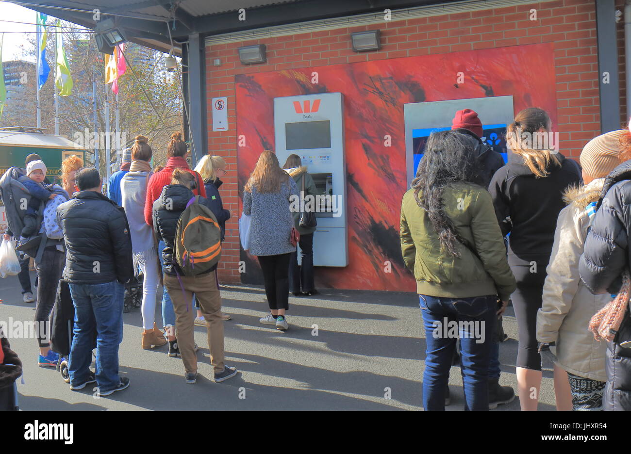 People queue for ATM in Melbourne Australia Stock Photo - Alamy
