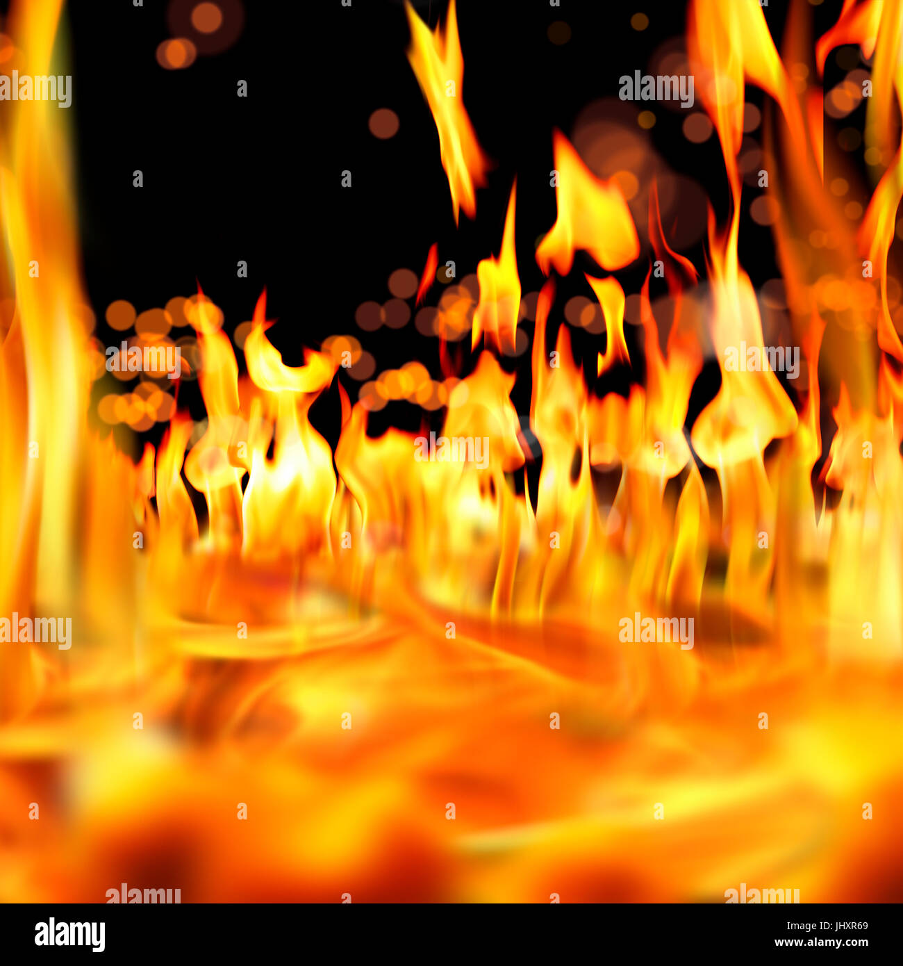 Close up fire flames over black background Stock Photo - Alamy