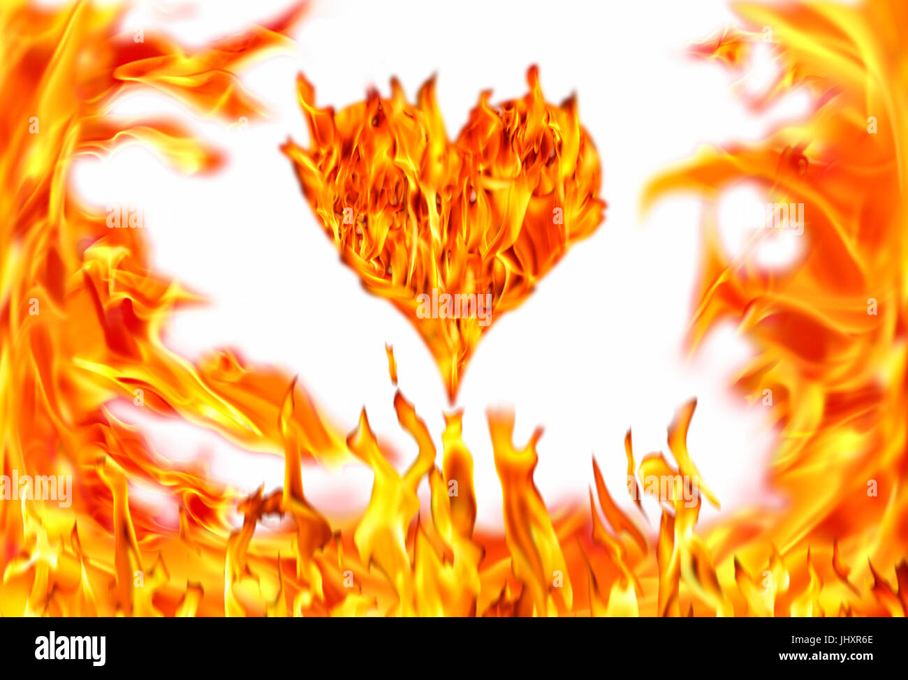 Conceptual image of burning heart shape and fire flames Stock Photo - Alamy