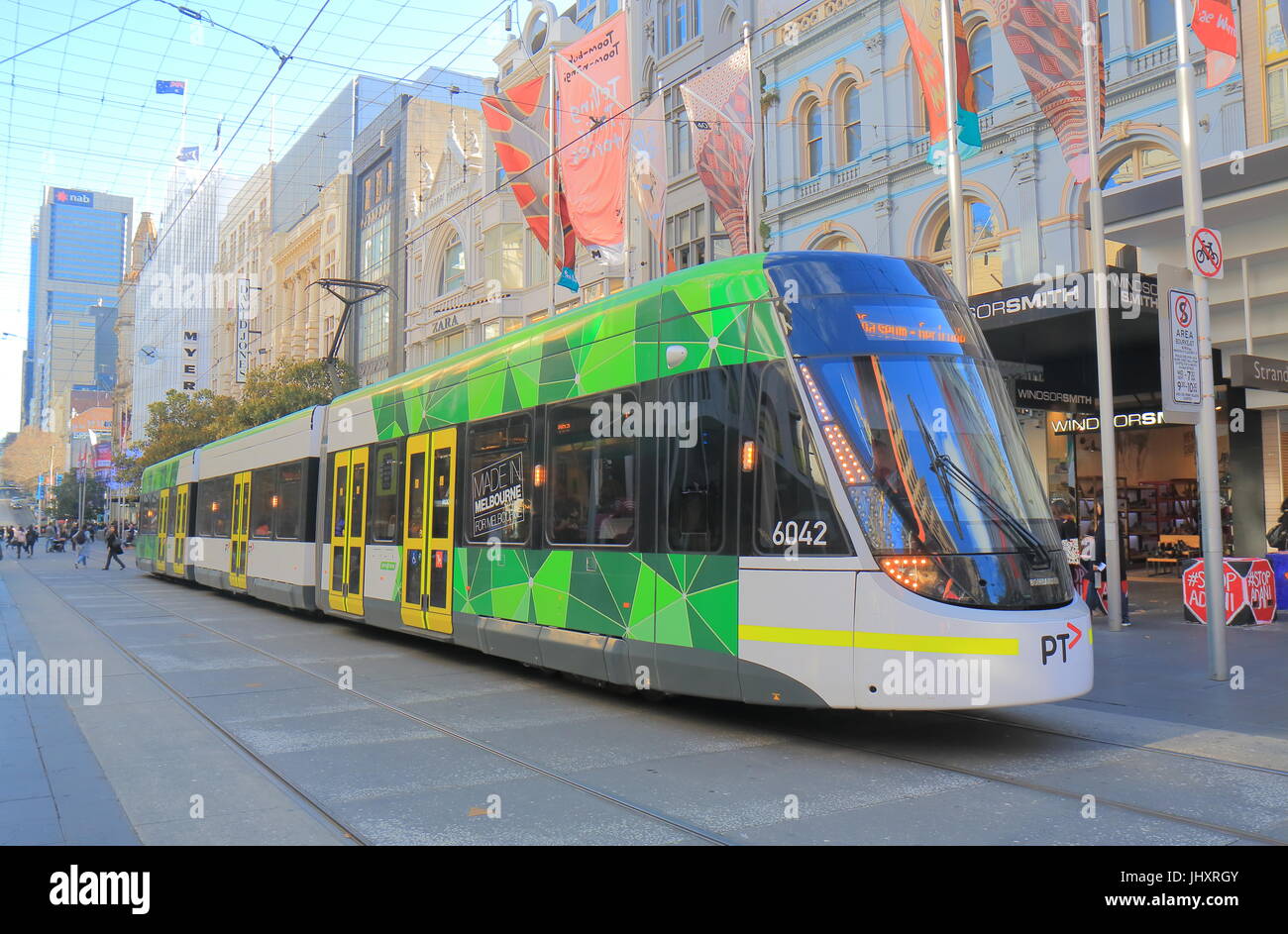 Modern tram runs in Melbourne downtown Australia. Melbourne has the ...
