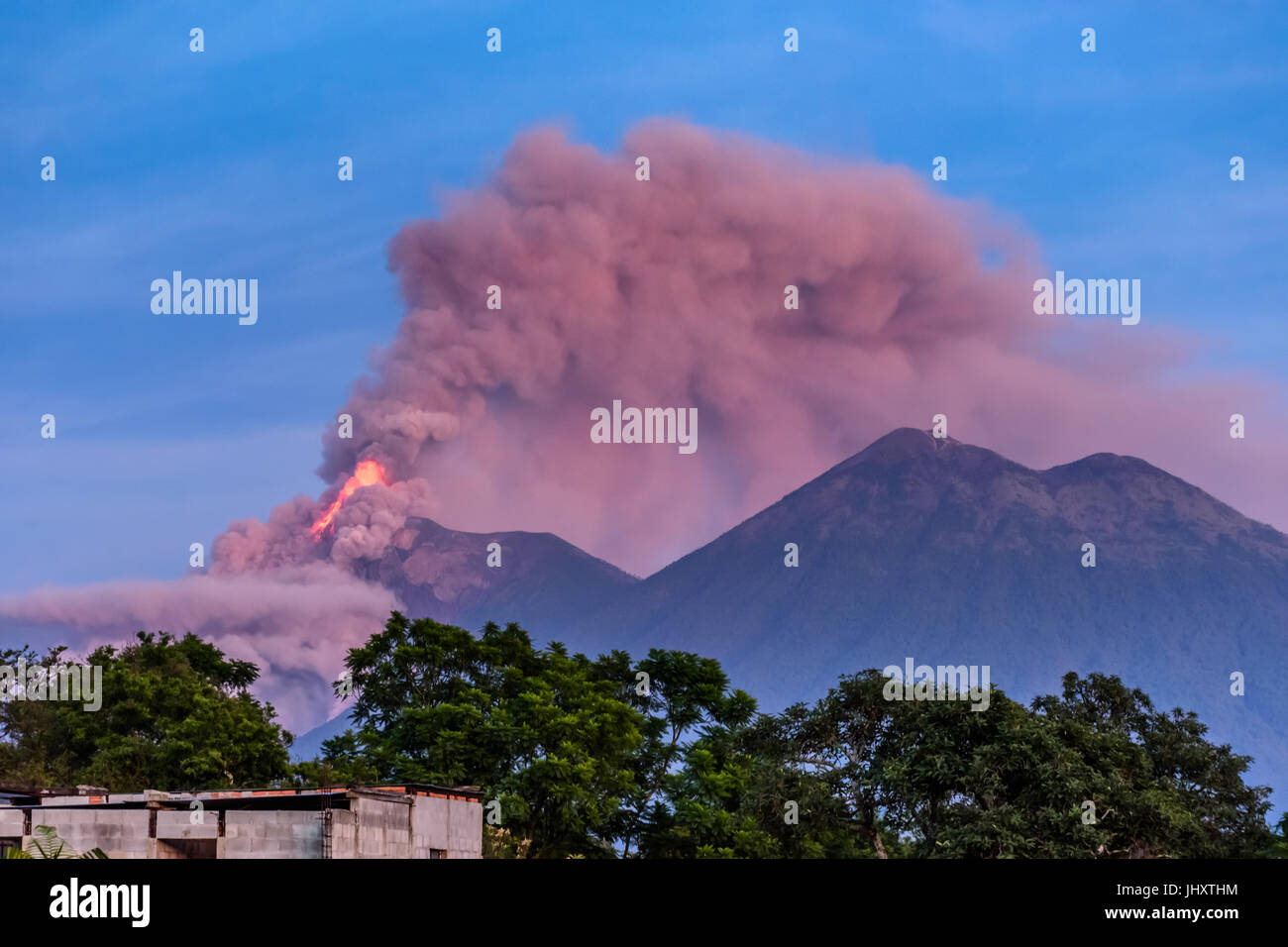 Lava & smoke spurt from erupting Fuego volcano next to Acatenango ...