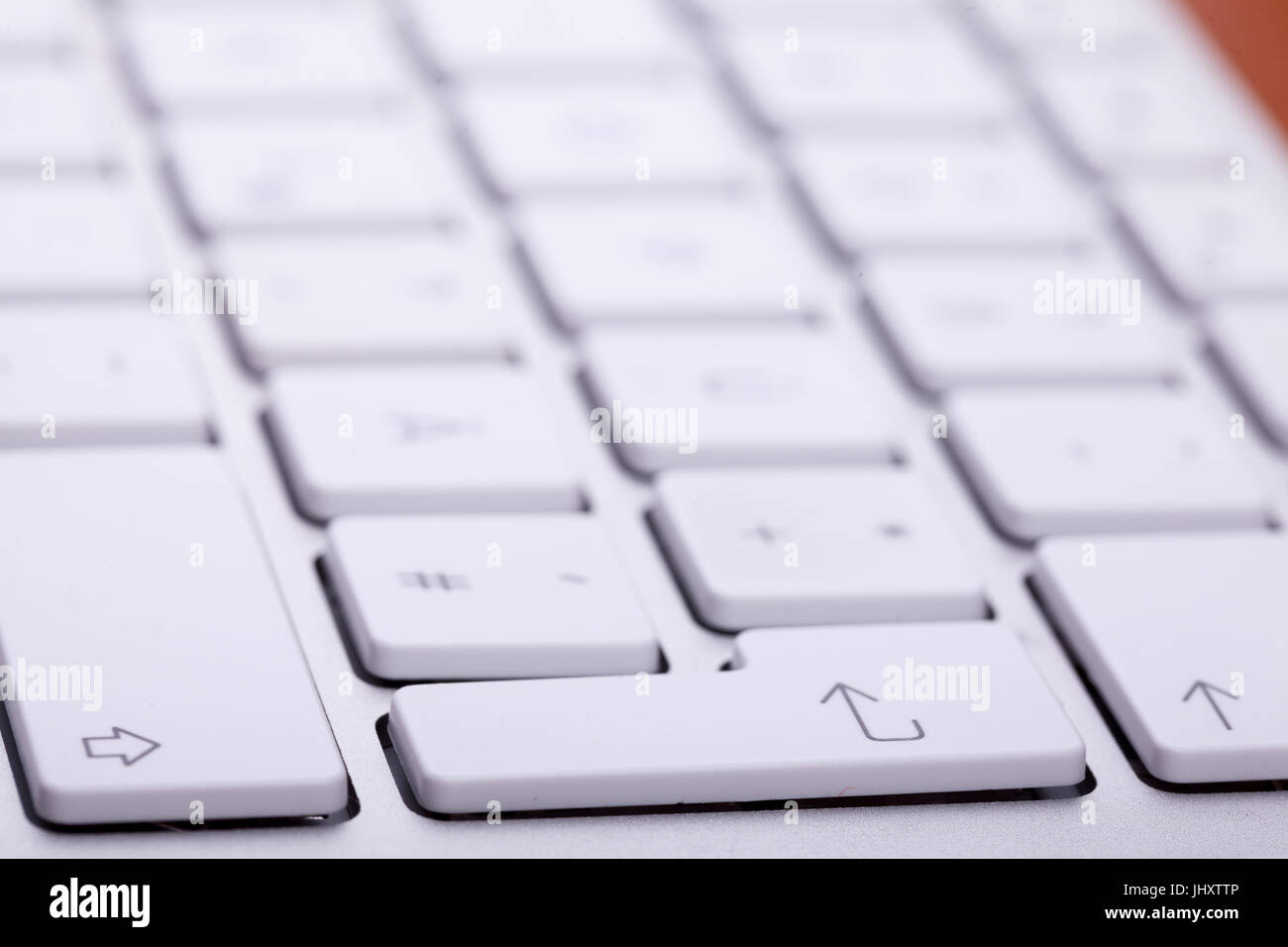 White aluminum keyboard in close up Stock Photo - Alamy