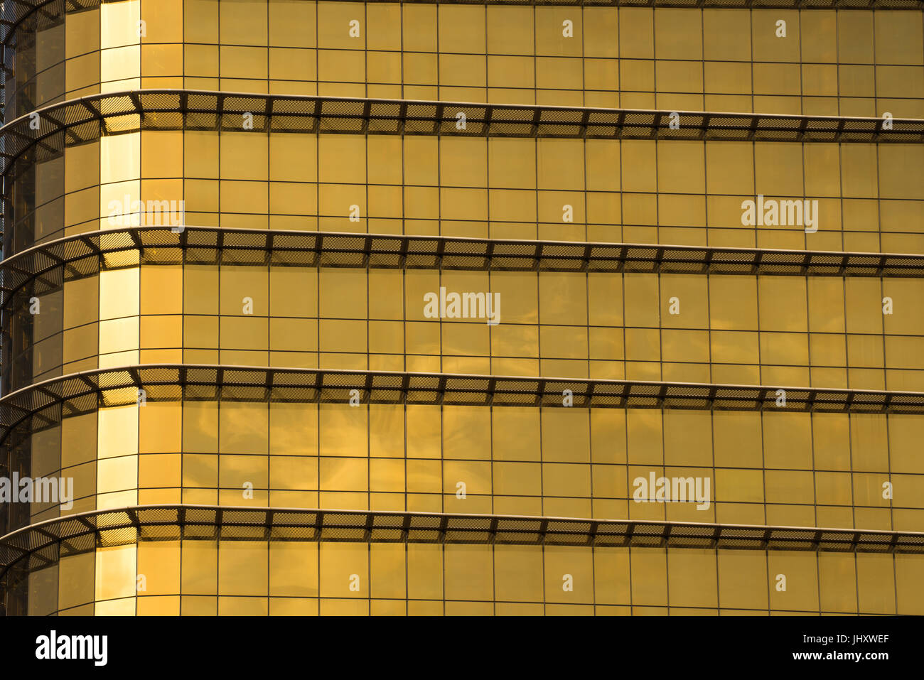yellow or gold mirror glass building, exterior building Stock Photo - Alamy
