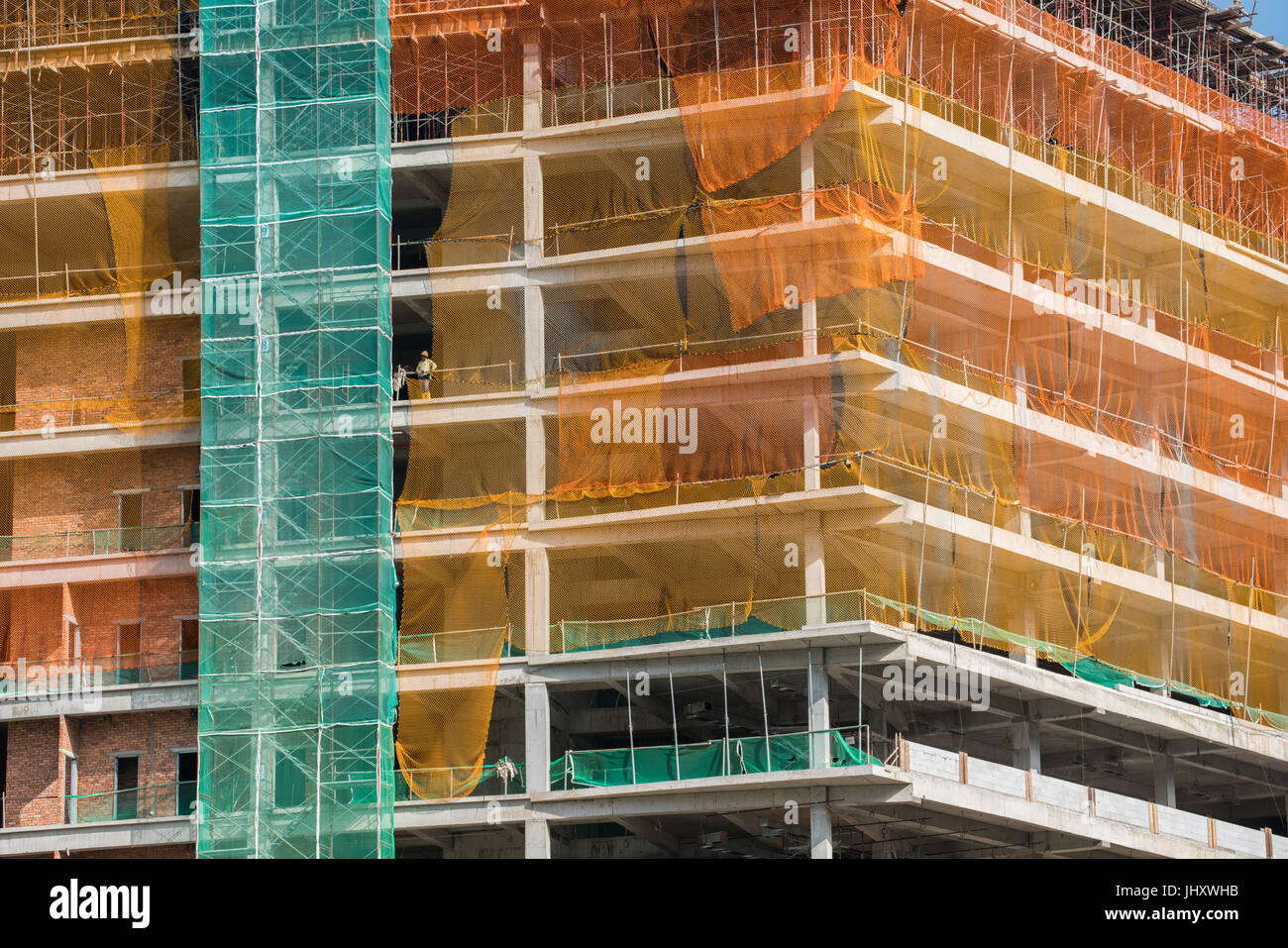 Mesh sheet cover building construction site Stock Photo - Alamy