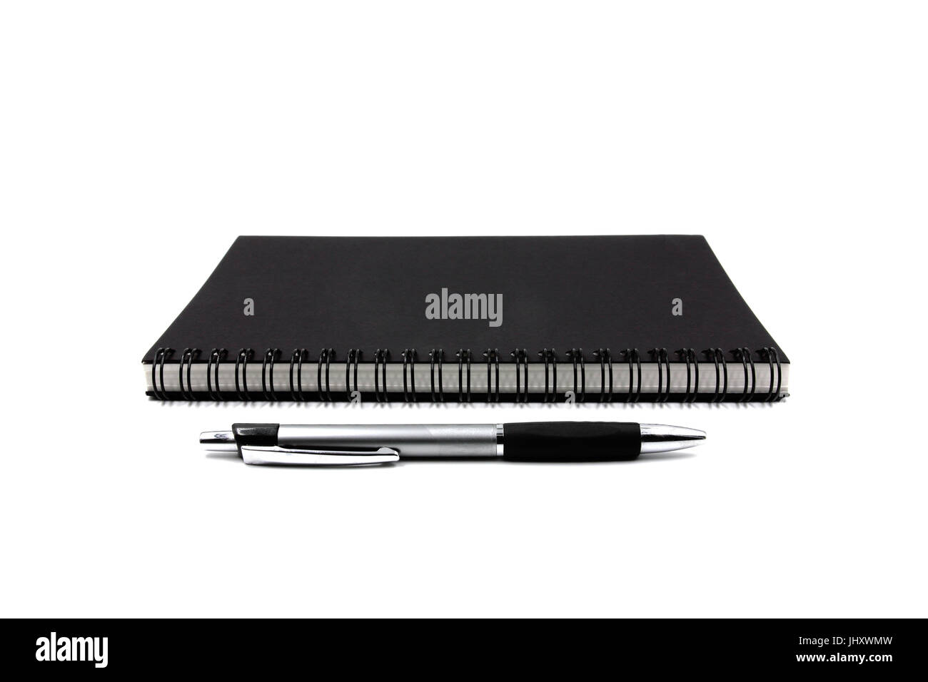Notebook and pen isolated on white background Stock Photo - Alamy