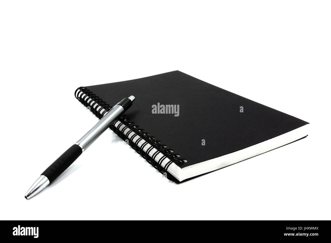 Notebook and pen isolated on white background Stock Photo - Alamy