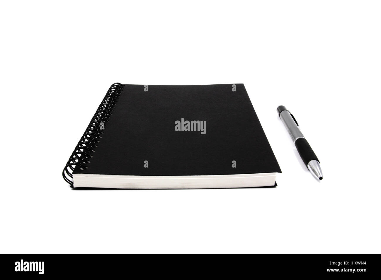 Notebook and pen isolated on white background Stock Photo - Alamy