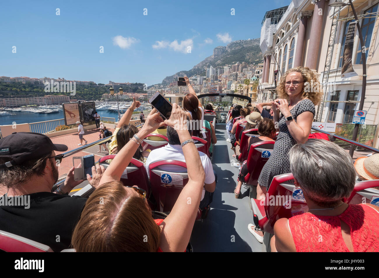 Tourists on a guided tour with a Hop on Hop off bus, Monte Carlo ...