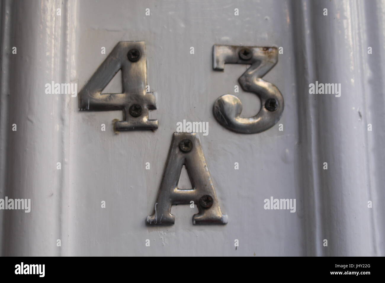 Apartment door numbers hi-res stock photography and images - Alamy