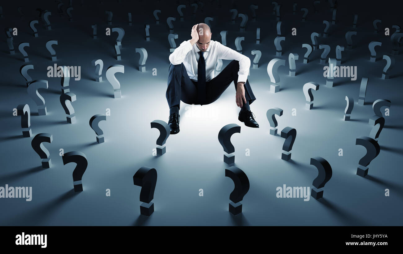Businessman with many question marks. Concept of failure and problem ...