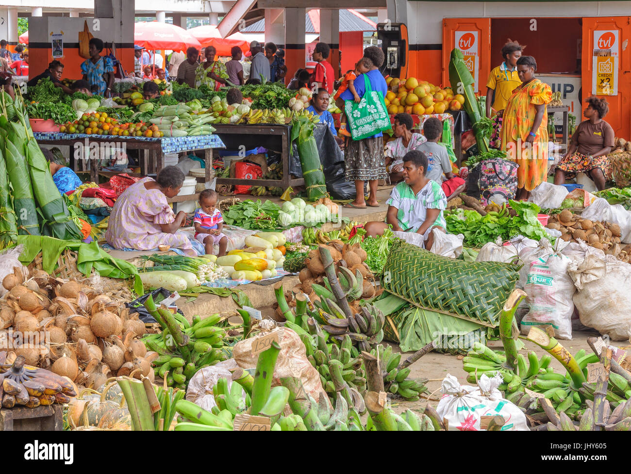 Marketeers and shoppers on the colourful covered main market (Mama's ...