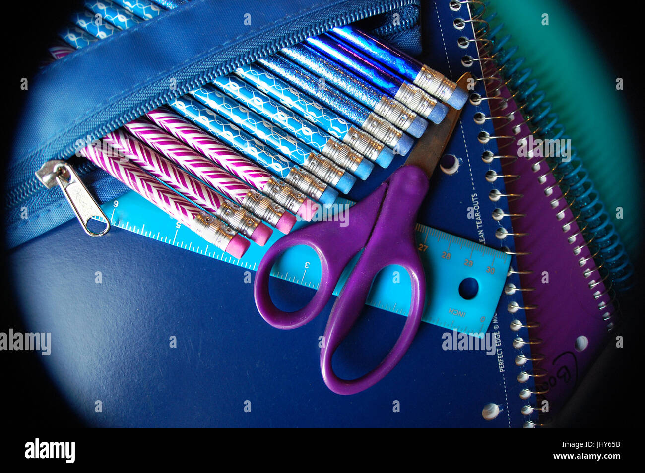 Blue and purple school supplies Stock Photo - Alamy
