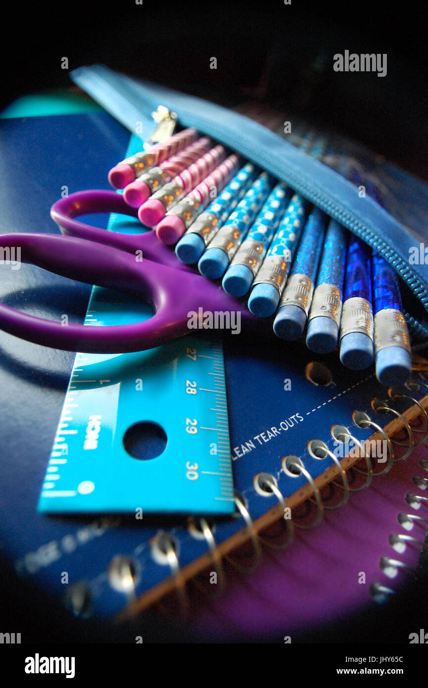 Blue and purple school supplies Stock Photo - Alamy