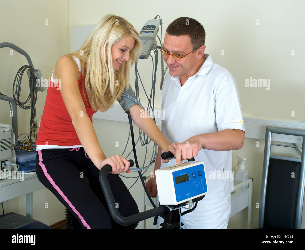 Young woman carries out an ergometer test in the medical practise ...