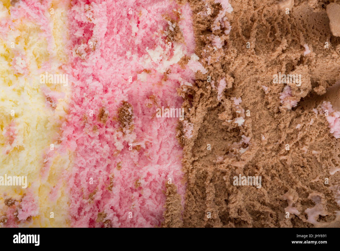 multi-color ice cream with rough surface as background and texture ...