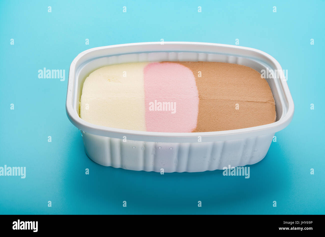 multi-color ice cream on blue backgrond Stock Photo - Alamy