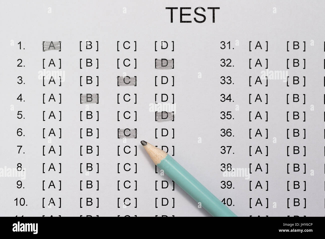 test score sheet with answers and pencil close up Stock Photo - Alamy
