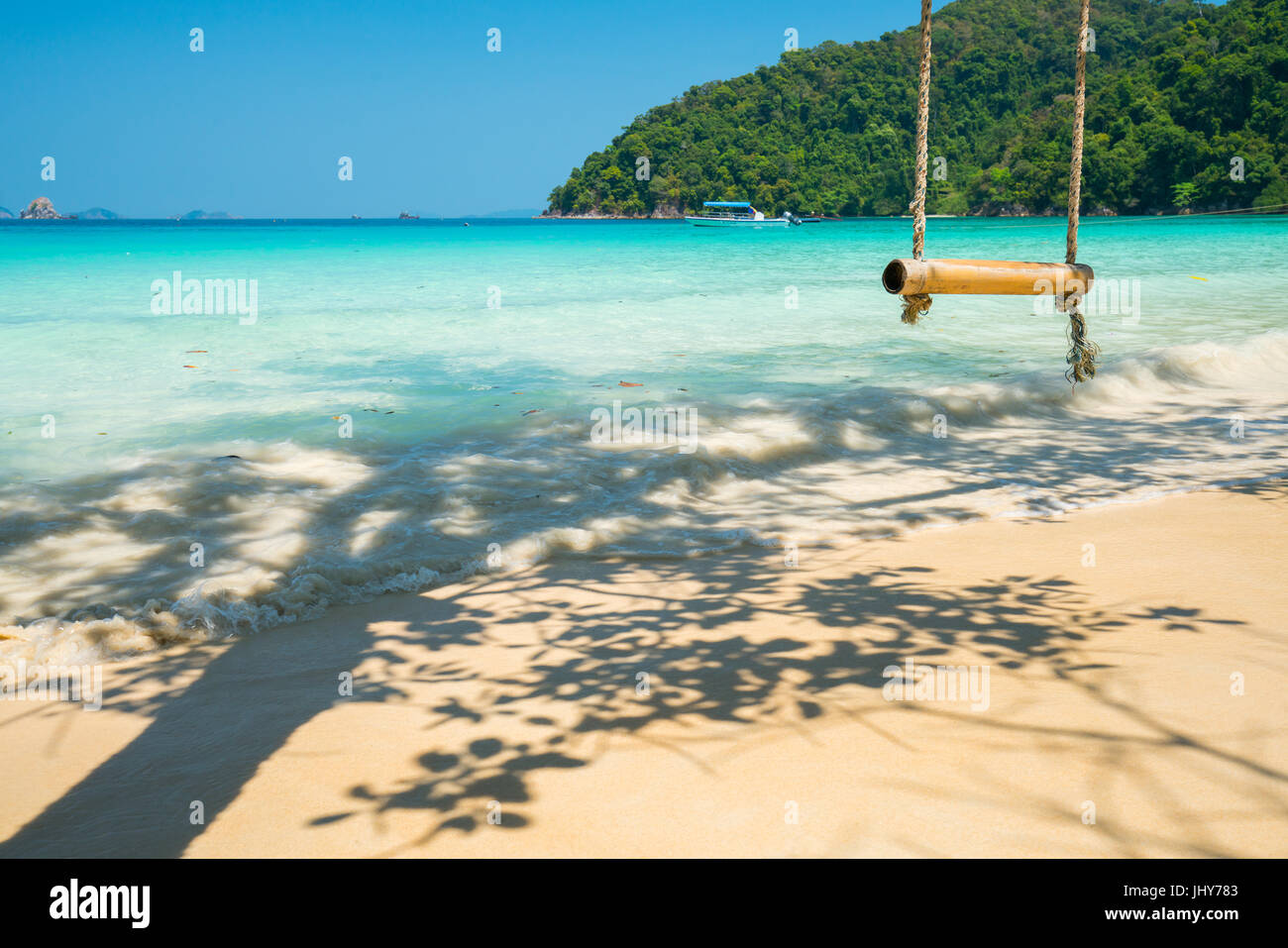 swing hang on big tree over beach sea background, Nyaung Oo Phee ...