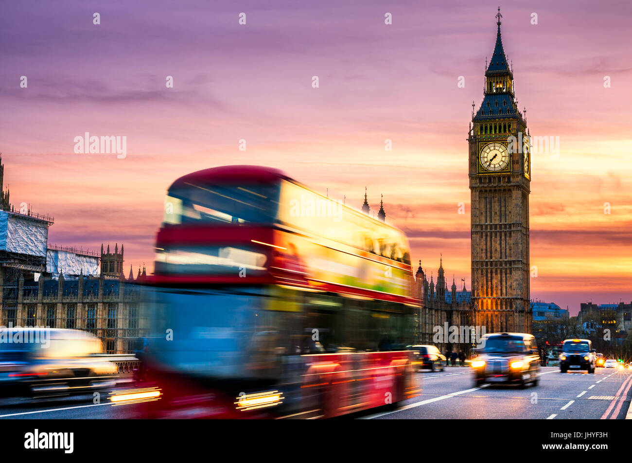 Big Ben with the Houses of Parliament and a red double-decker bus ...