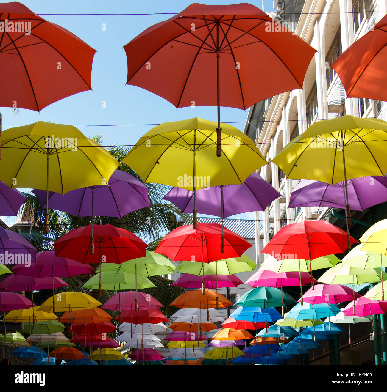 Set of colorful umbrella decorating a street Stock Photo - Alamy
