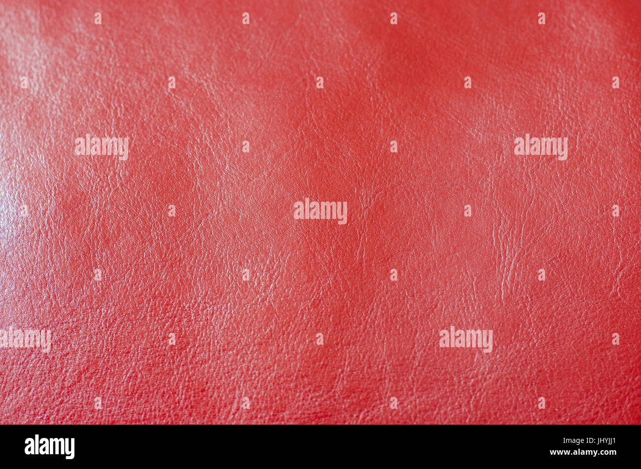 Red color leather texture background Stock Photo - Alamy