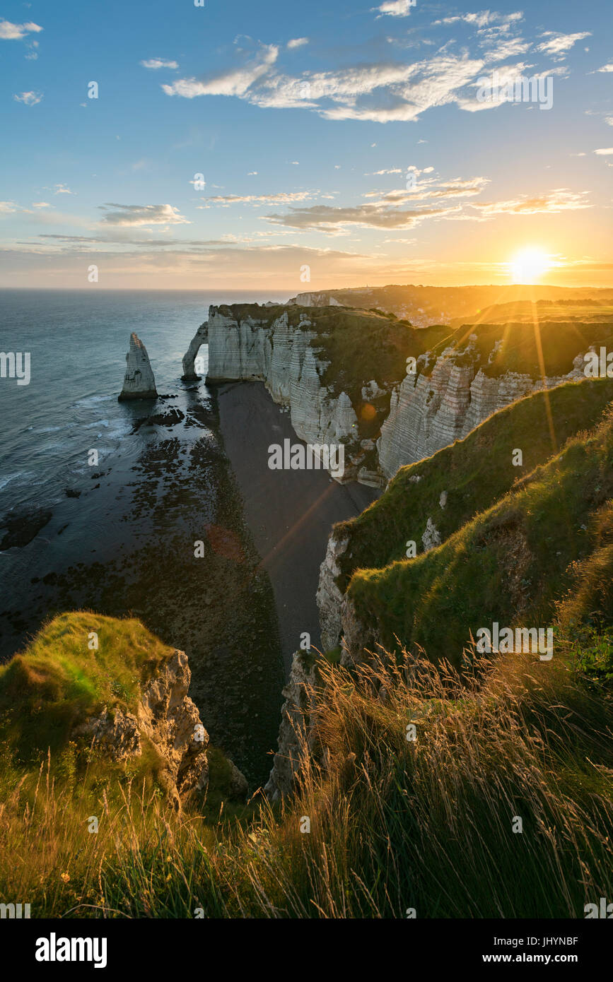 Sun rays at dawn at the cliffs, Etretat, Normandy, France, Europe Stock ...