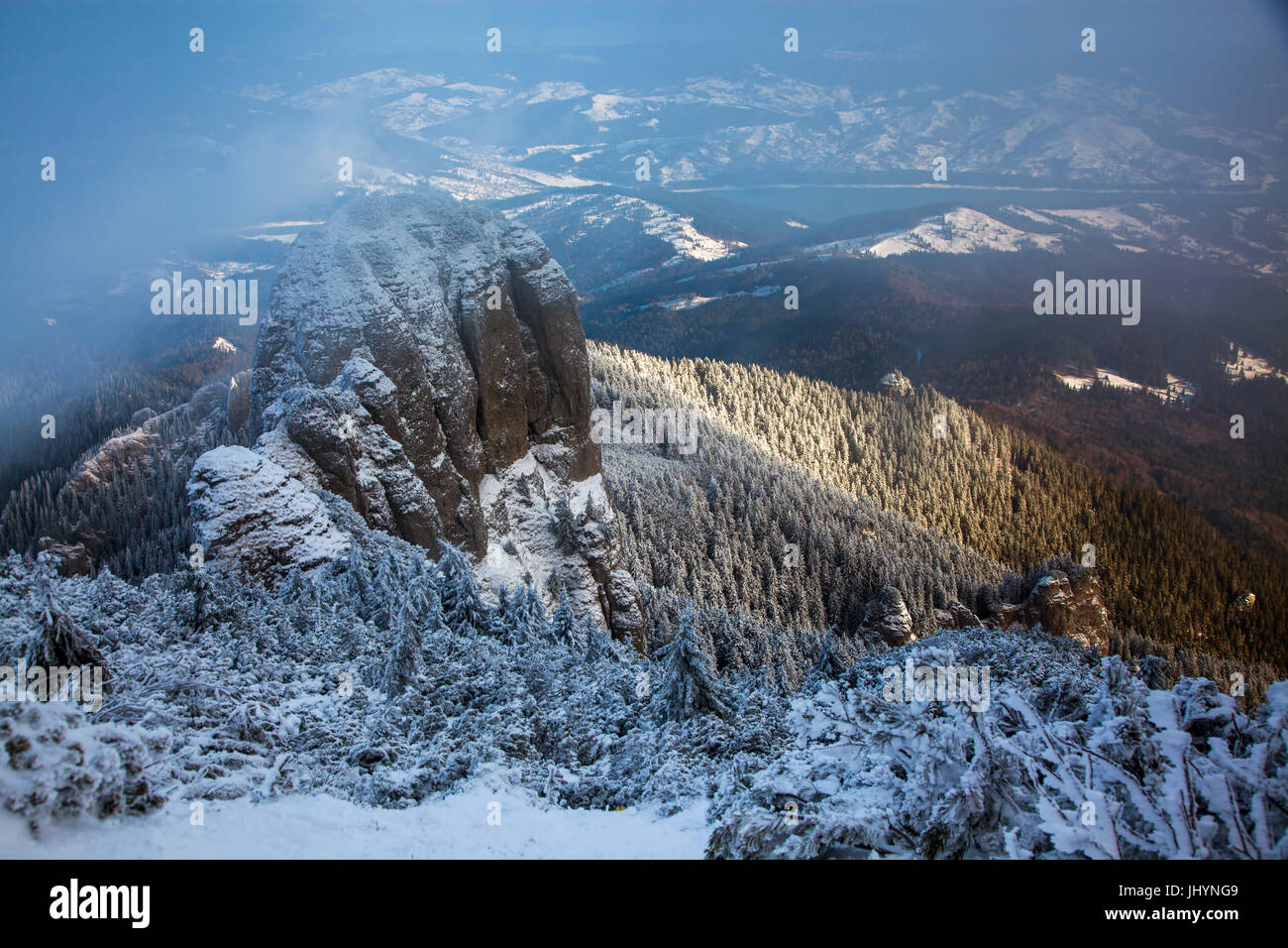 Foggy winter landscape in Ceahlaul Massif, Romania, Europe Stock Photo ...