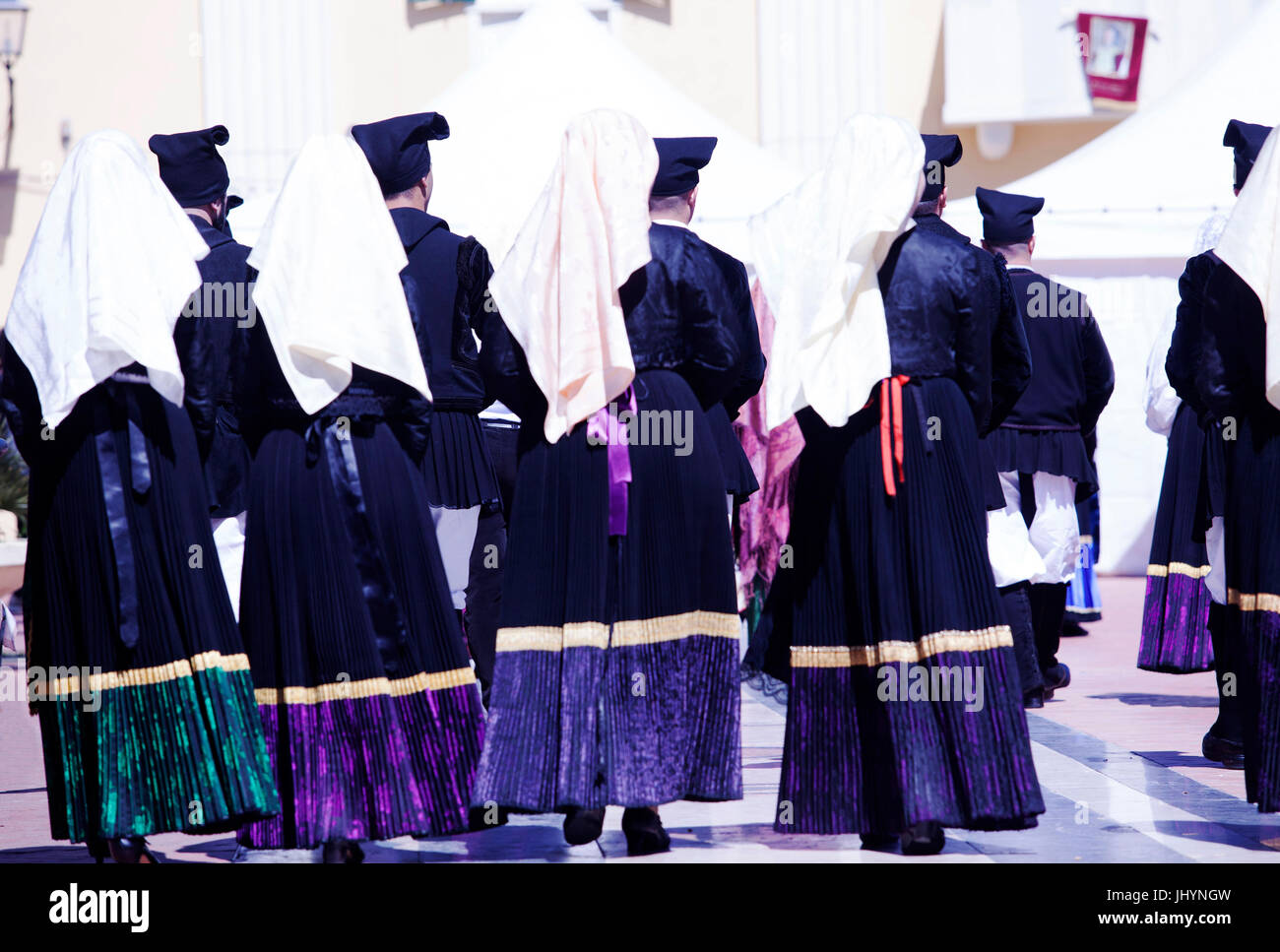 Men and women in traditional costume during the Saint Antioco ...