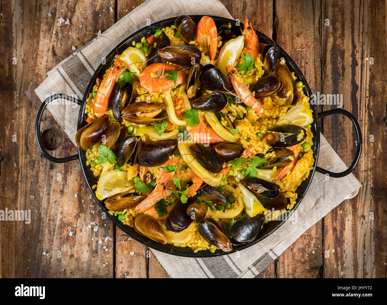 Traditional paella rustic Spanish Stock Photo - Alamy