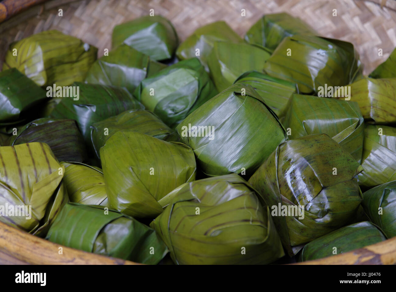 rice rolled in banana leaf , Philippines Stock Photo - Alamy