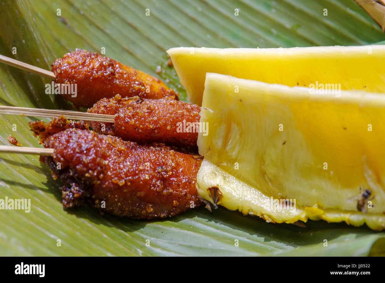 filipino traditional dessert turon(fried banana) and Pineapple Stock ...