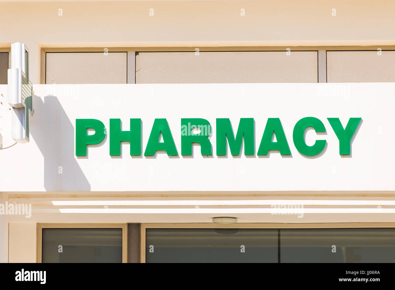Pharmacy sign on building Stock Photo - Alamy