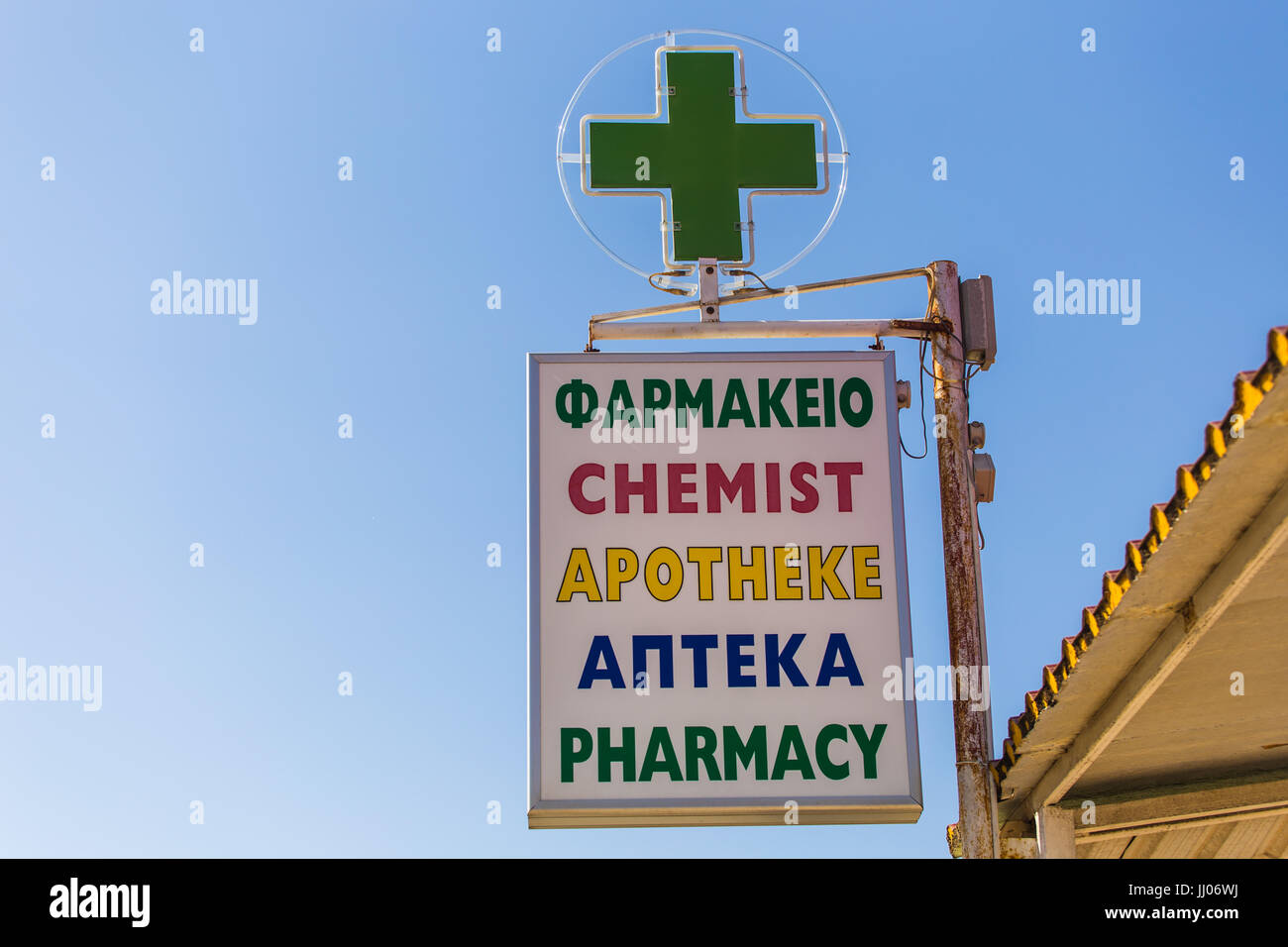 Pharmacy sign in different languages Stock Photo - Alamy