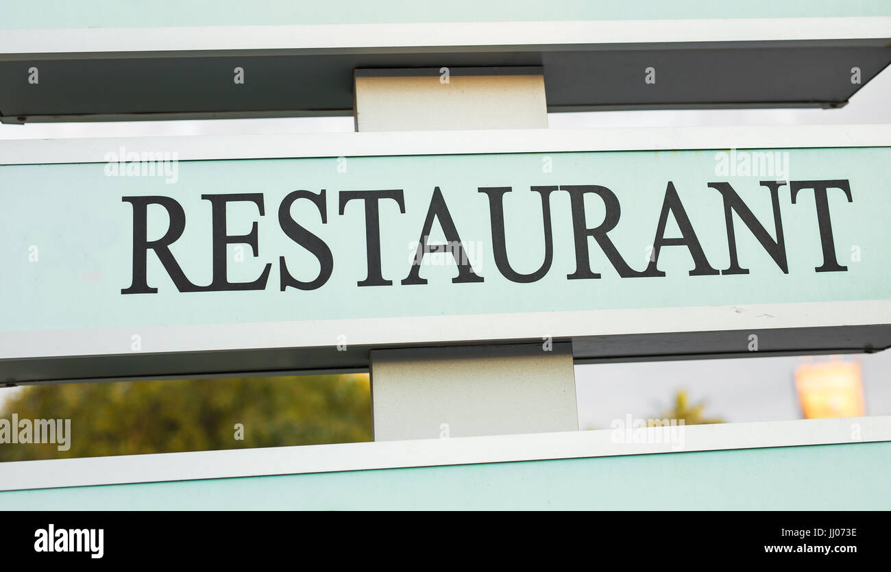Restaurant sign board Stock Photo - Alamy