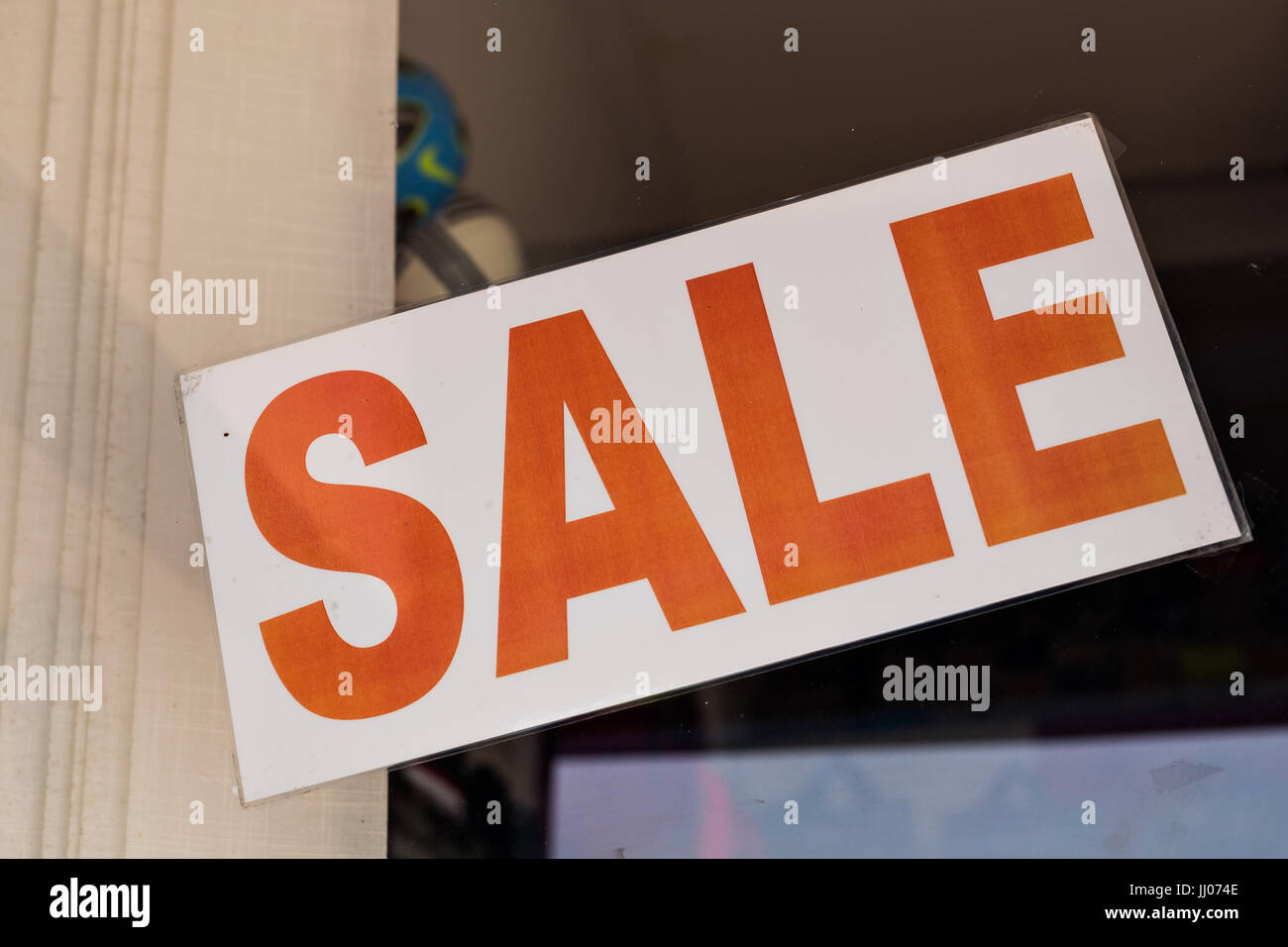Shop Window With Sale Sign Stock Photo - Alamy
