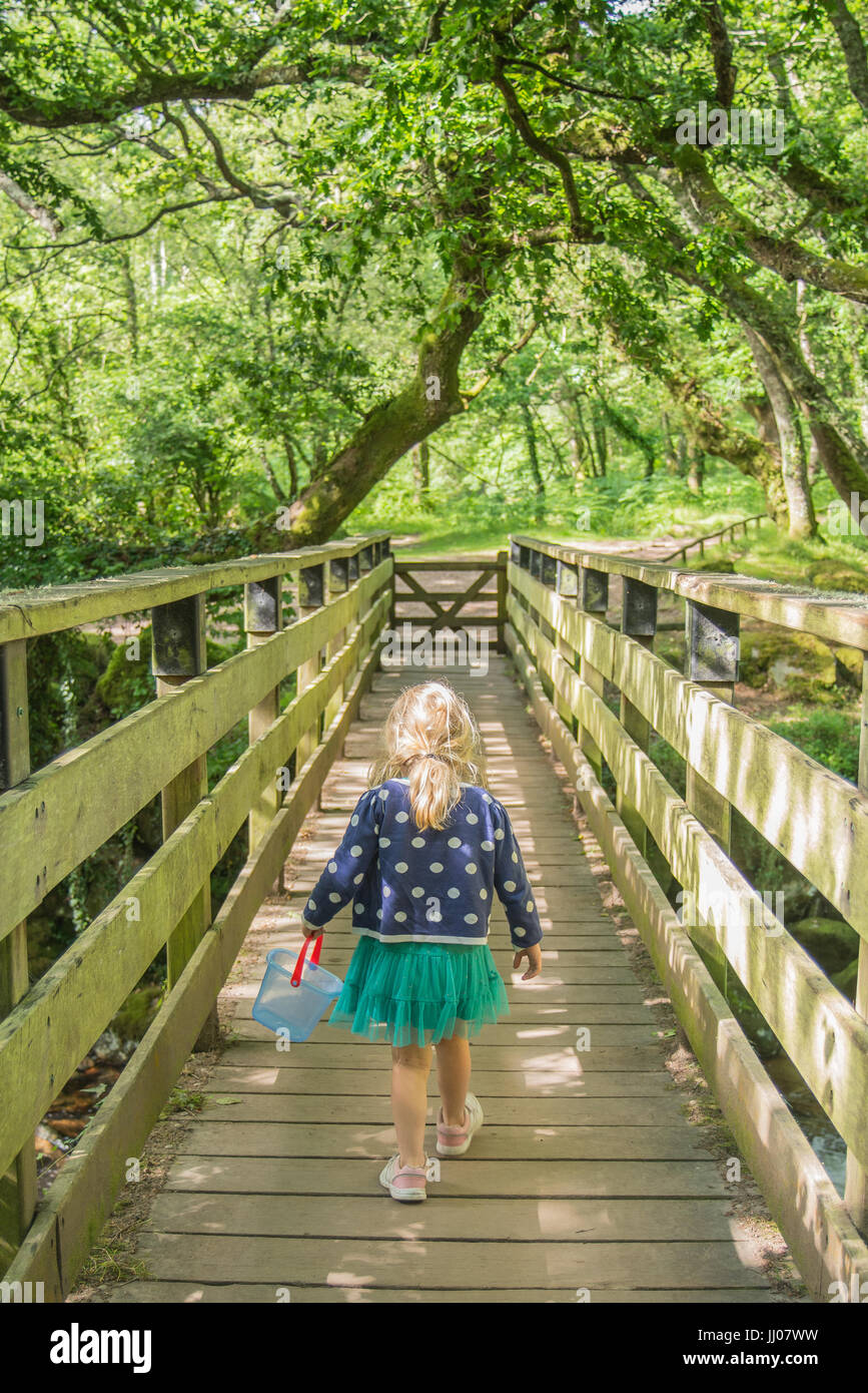 Little girl exploring the world Stock Photo - Alamy