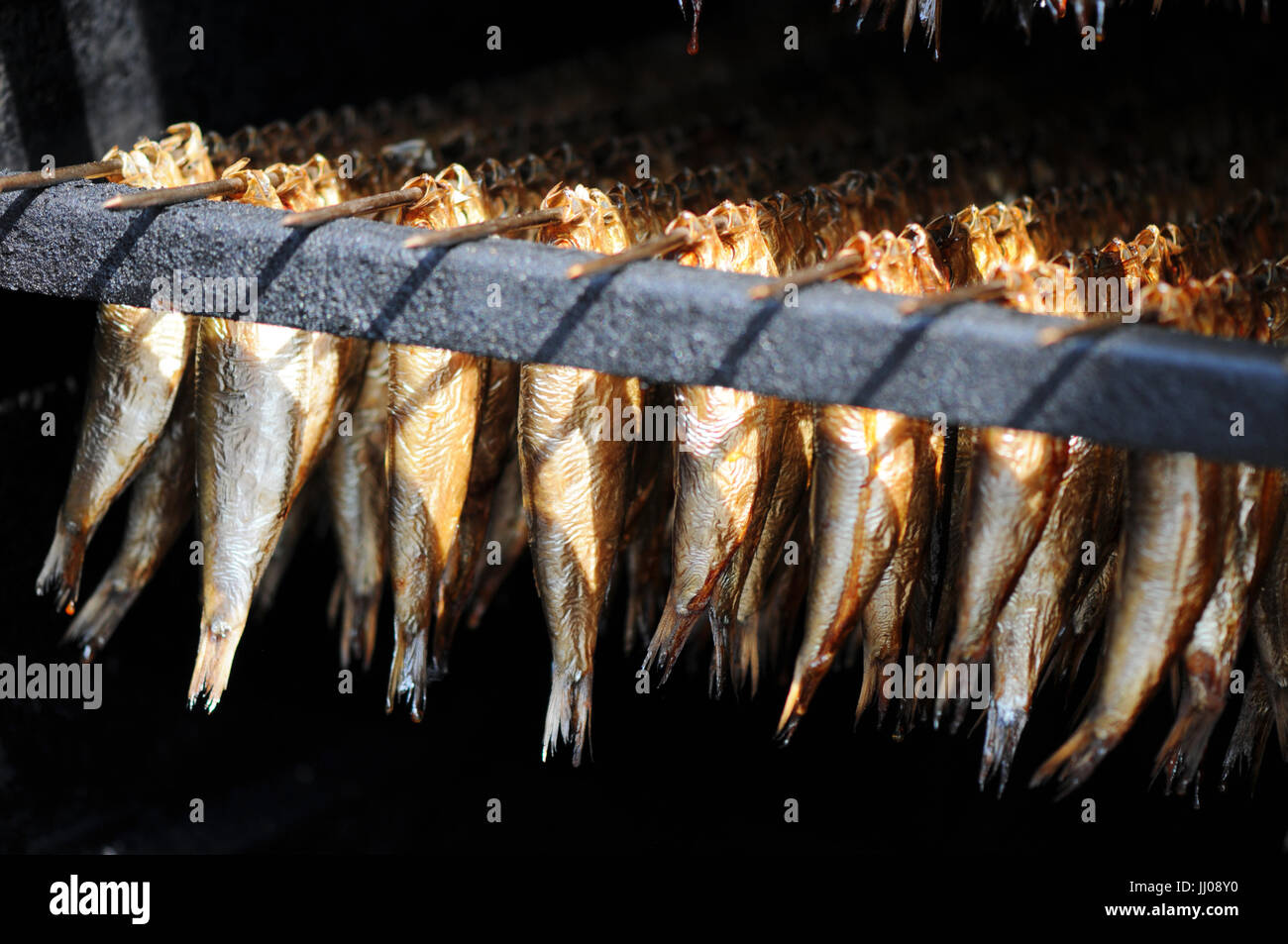 traditional fresh smoked fish in smoker Stock Photo - Alamy