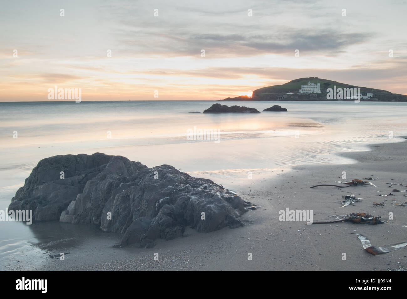 Beautiful sunset at Bigbury beach in Devon, UK Stock Photo - Alamy
