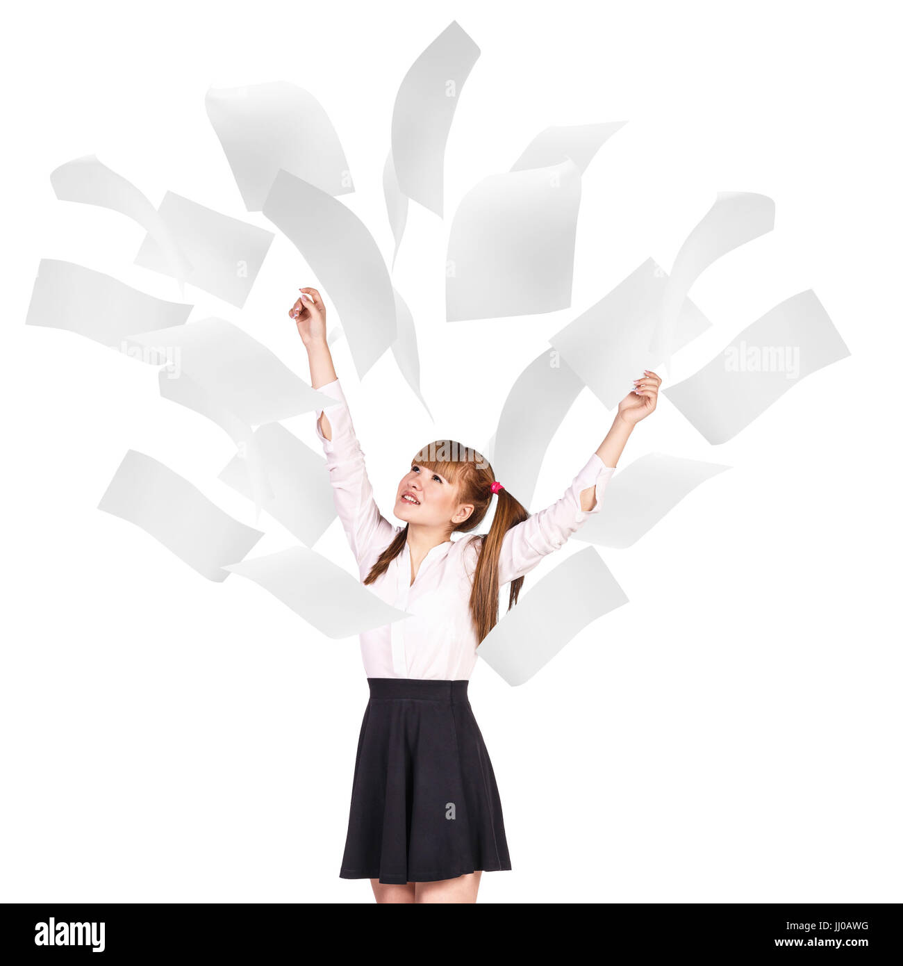 Young business woman under falling pages Stock Photo - Alamy