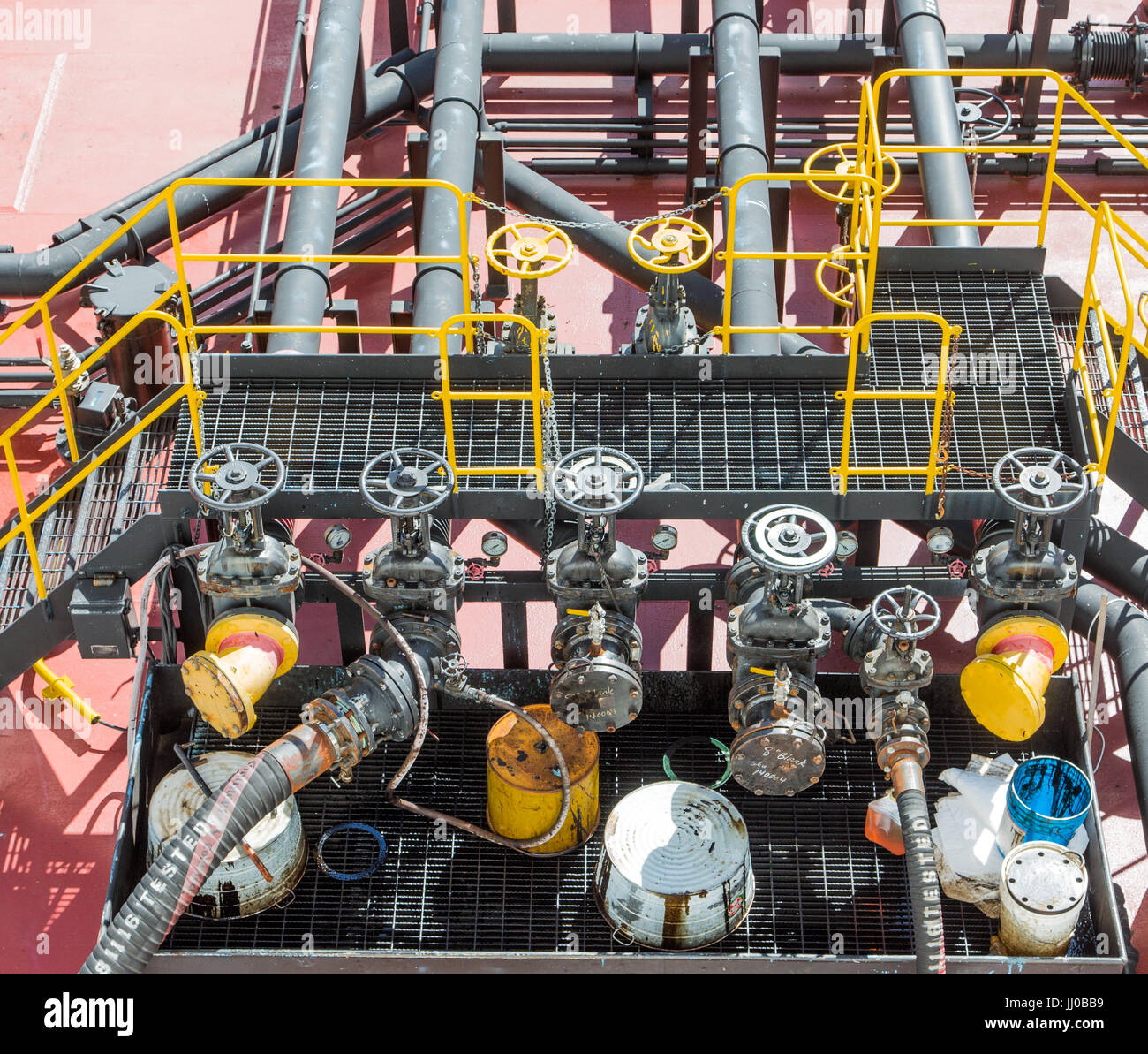 Pipes and valves on an industrial oil and fueling barge Stock Photo - Alamy