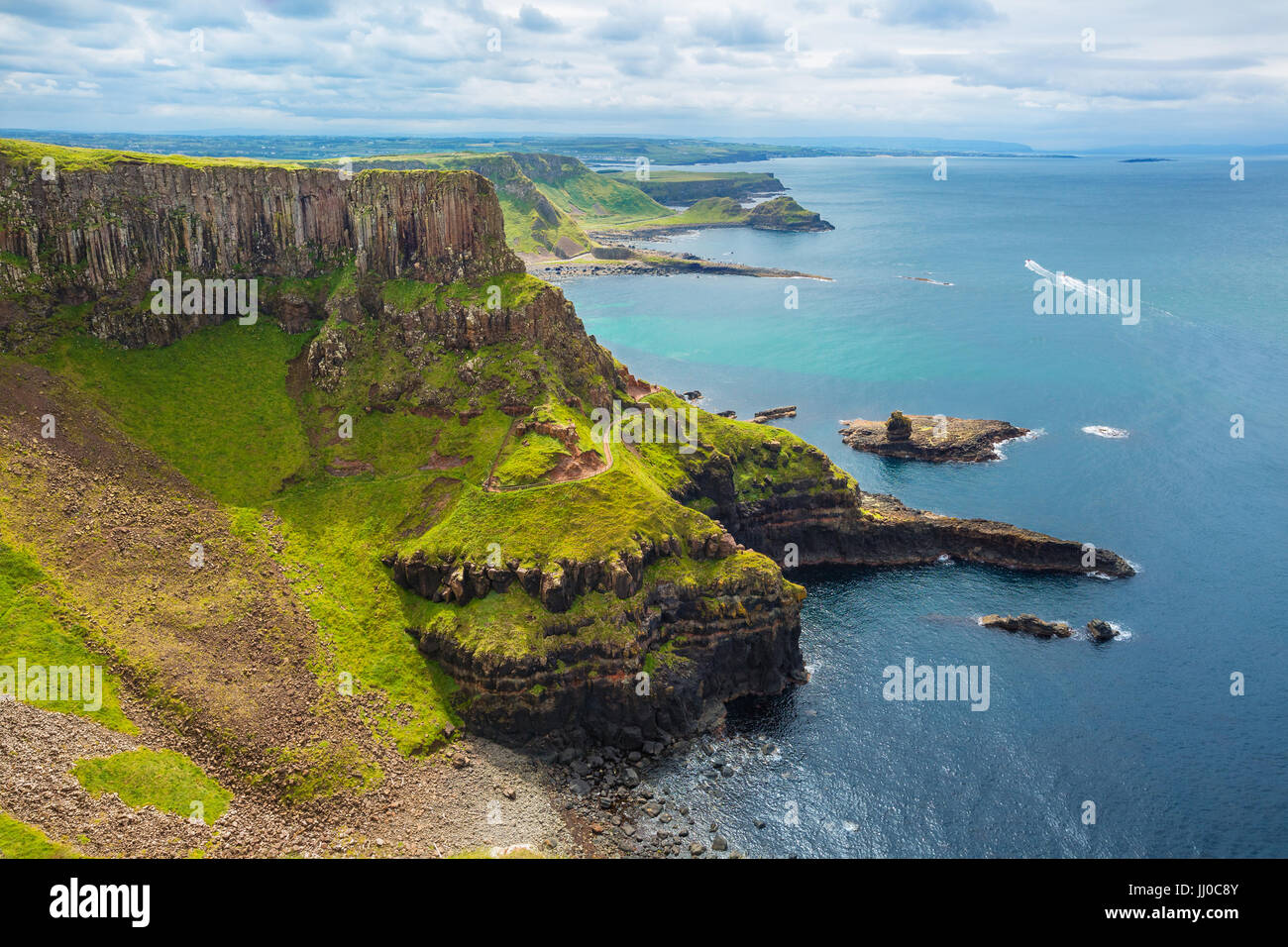 The Amphitheatre, Port Reostan Bay and Giant's Causeway on background ...