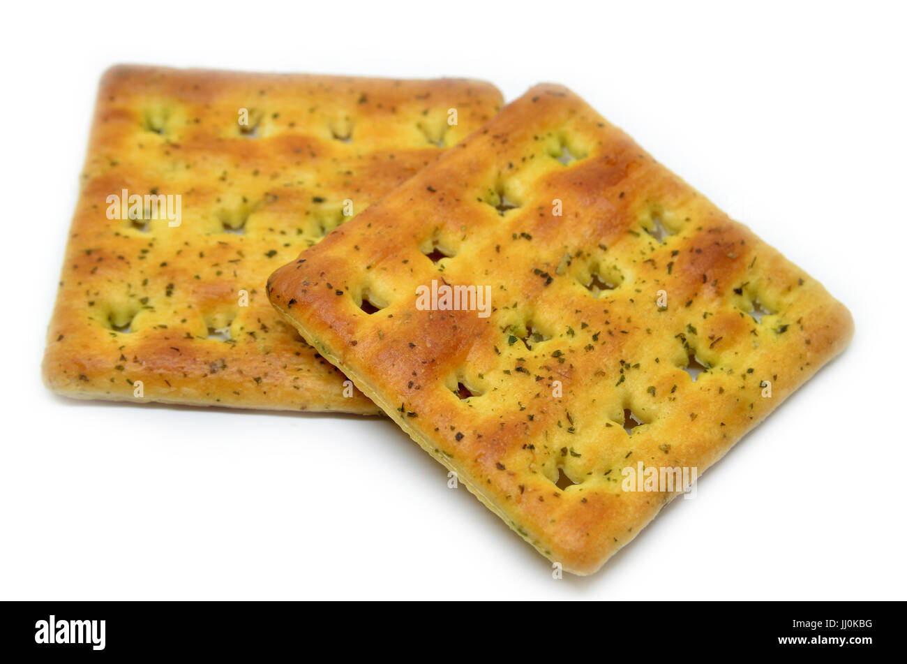 Salty crackers stack isolated on white background Stock Photo - Alamy